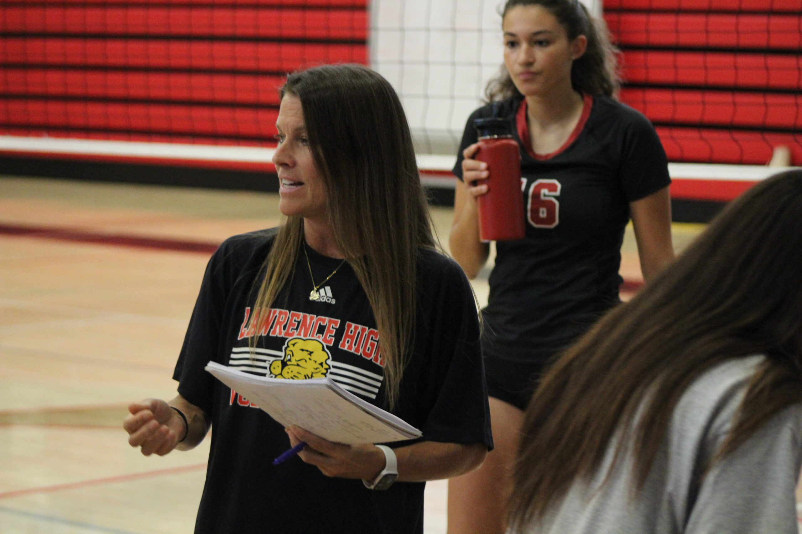 Lawrence community sends LHS volleyball coach off with celebration ...